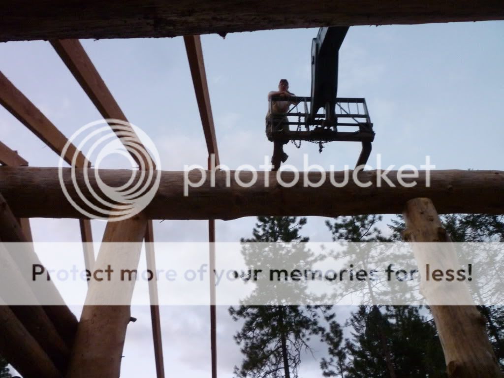 Full Log King Truss Tie Beam notch at full log walls?